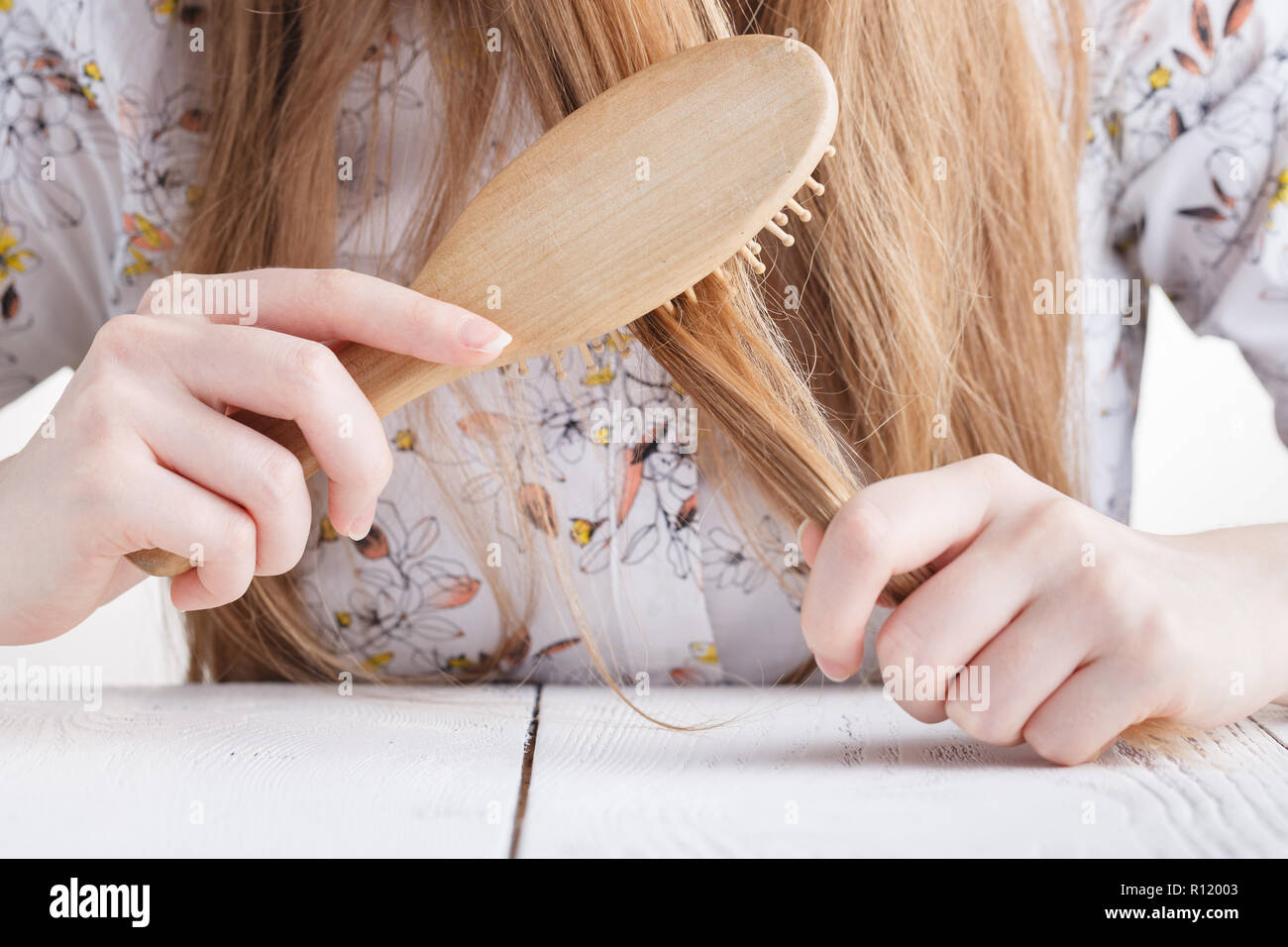 Haircombing hi-res stock photography and images - Alamy