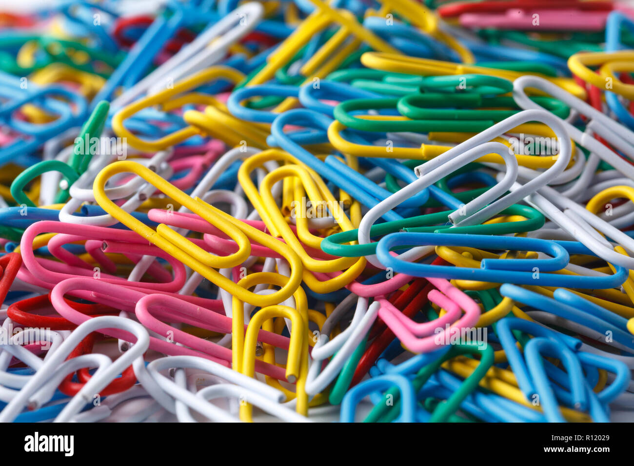 Paper clips isolated on white background Stock Photo - Alamy