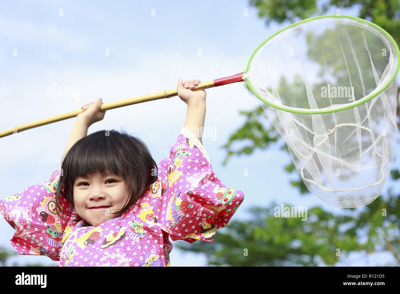 young girl with sweep net Stock Photo - Alamy
