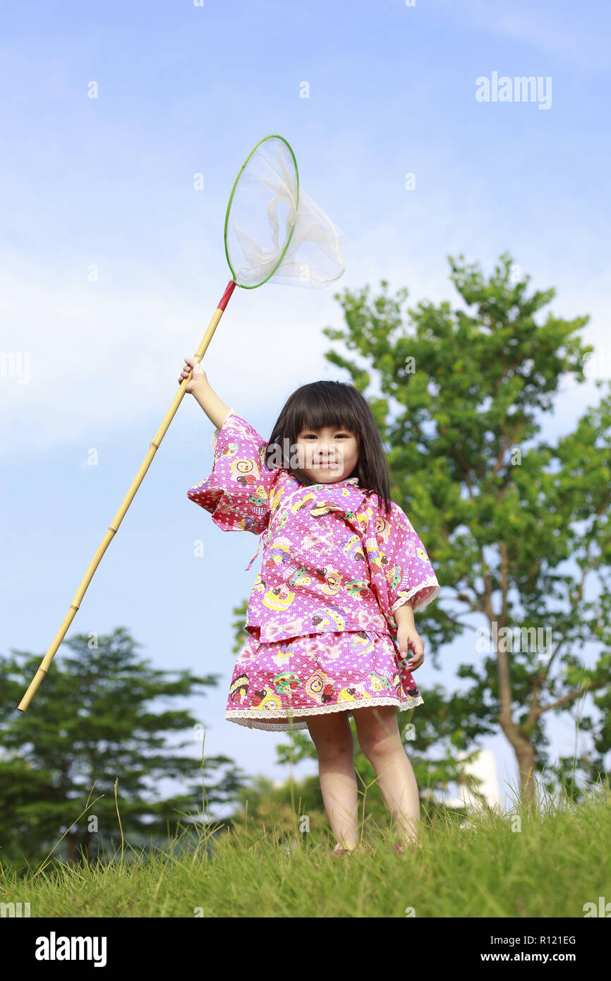 young girl with sweep net Stock Photo - Alamy
