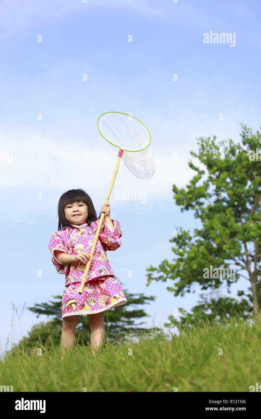 young girl with sweep net Stock Photo - Alamy