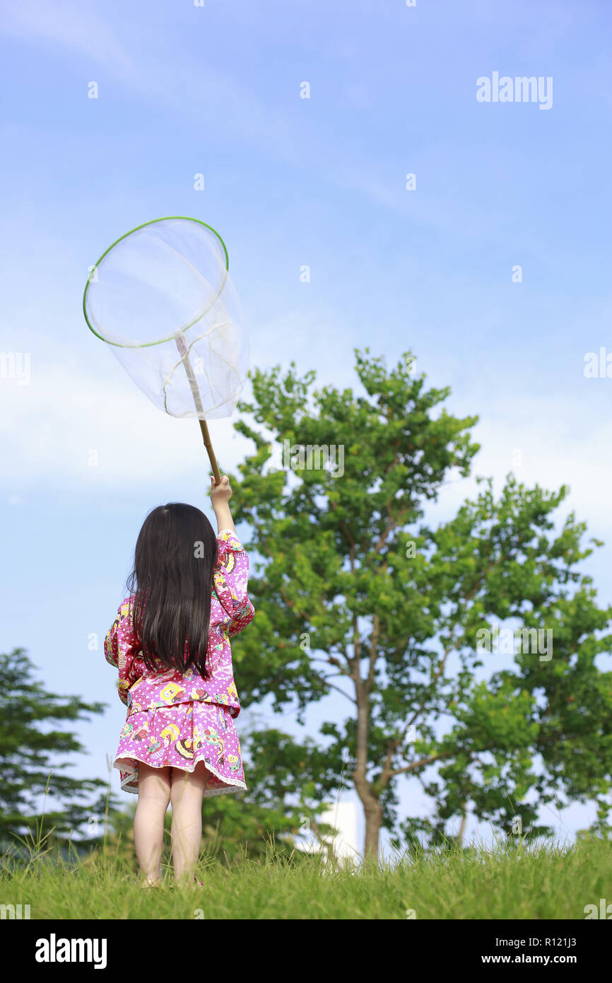 young girl with sweep net Stock Photo - Alamy