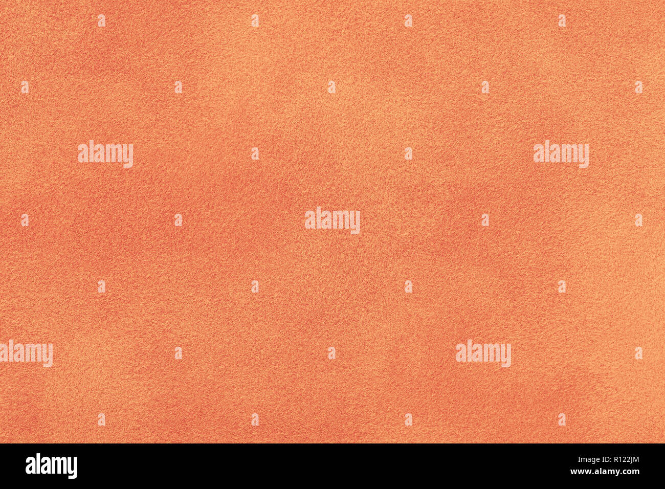 Orange matte background of suede fabric, closeup. Velvet texture of ...