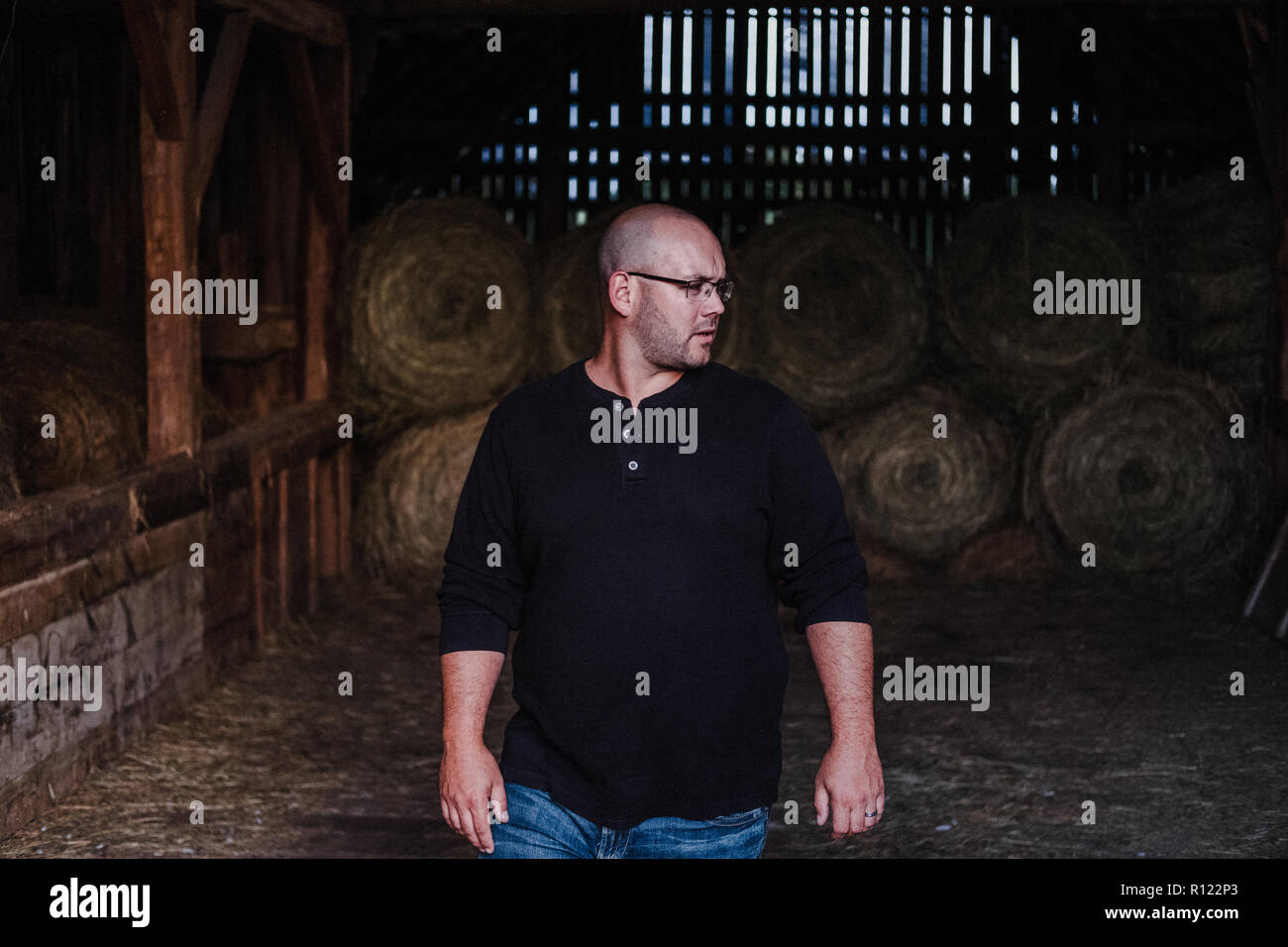 Man walking out of barn hi-res stock photography and images - Alamy