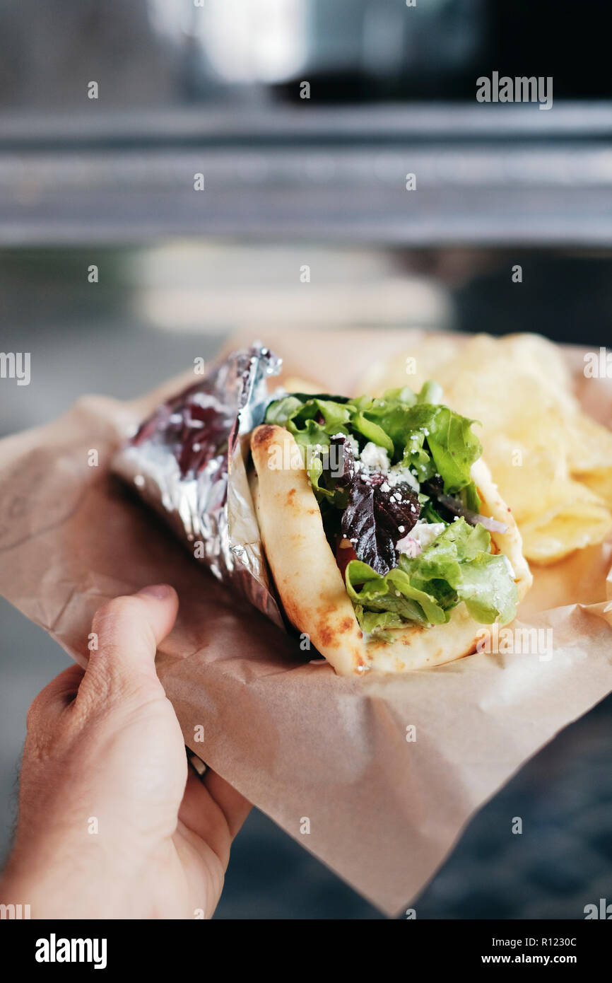 Meal of salad wrap and potato chips Stock Photo - Alamy