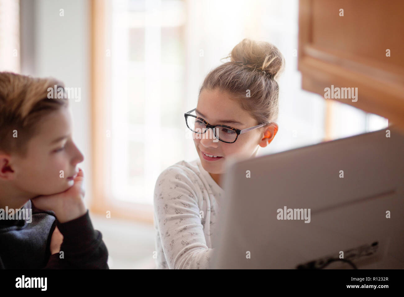 Siblings studying hi-res stock photography and images - Alamy