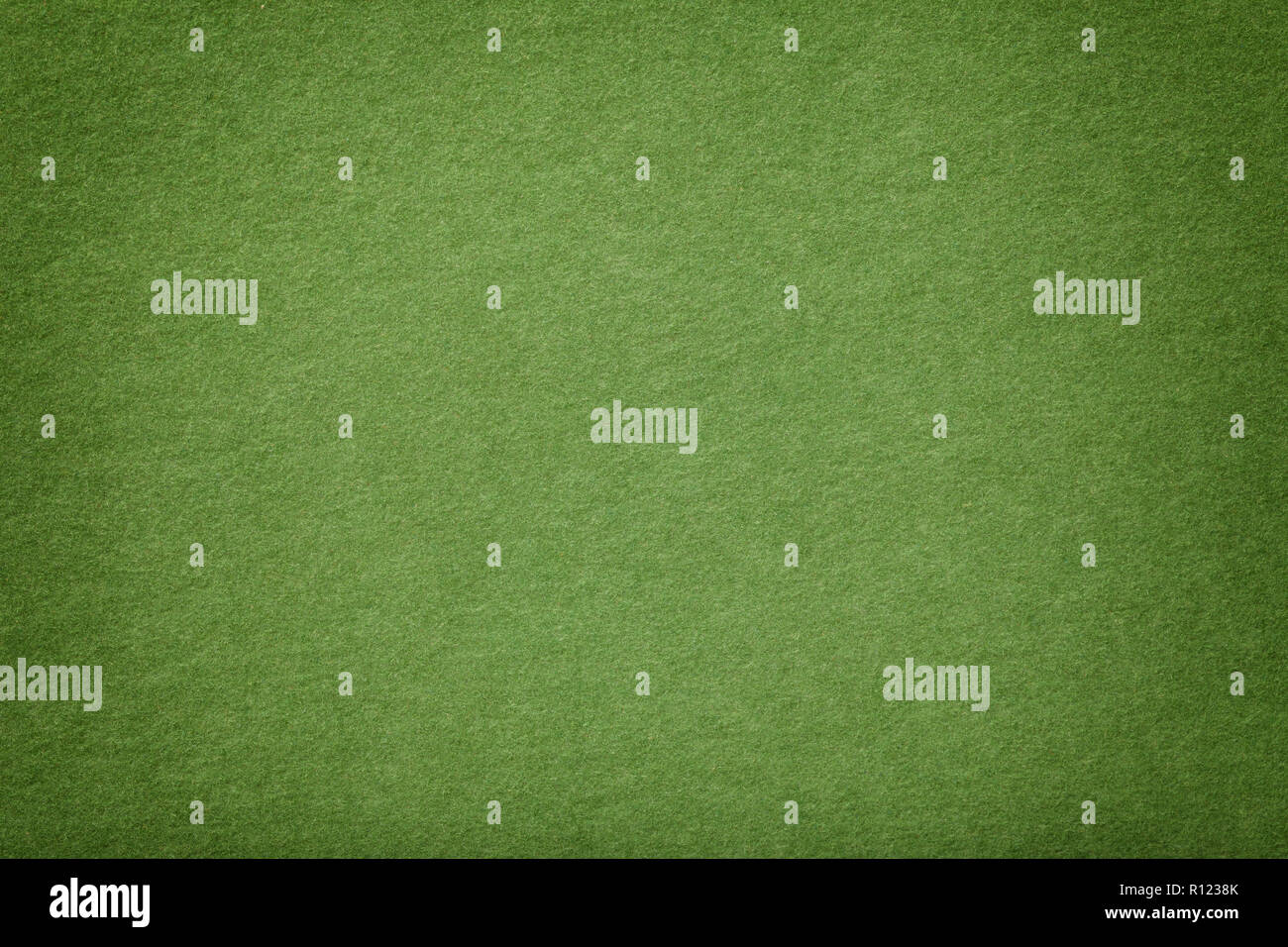 Light green matte background of suede fabric, closeup. Velvet texture ...