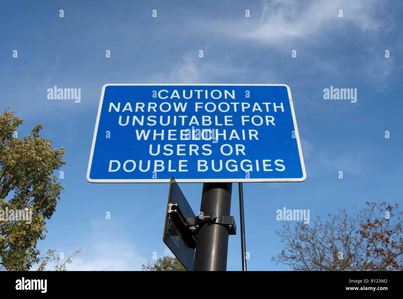 british blue and white sign indicating a narrow footpath unsuitable for ...