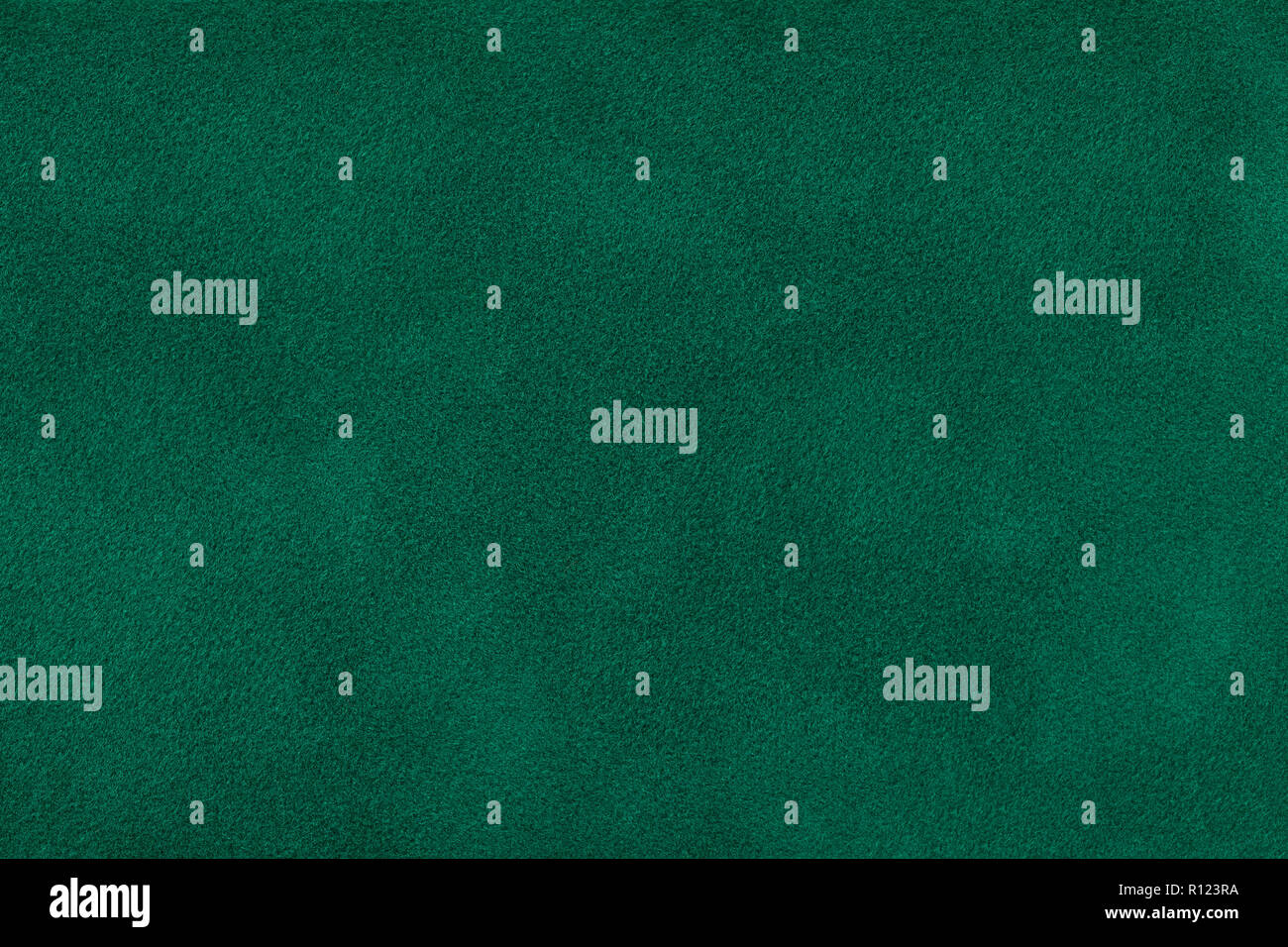 Dark green matte background of suede fabric, closeup. Velvet texture of ...