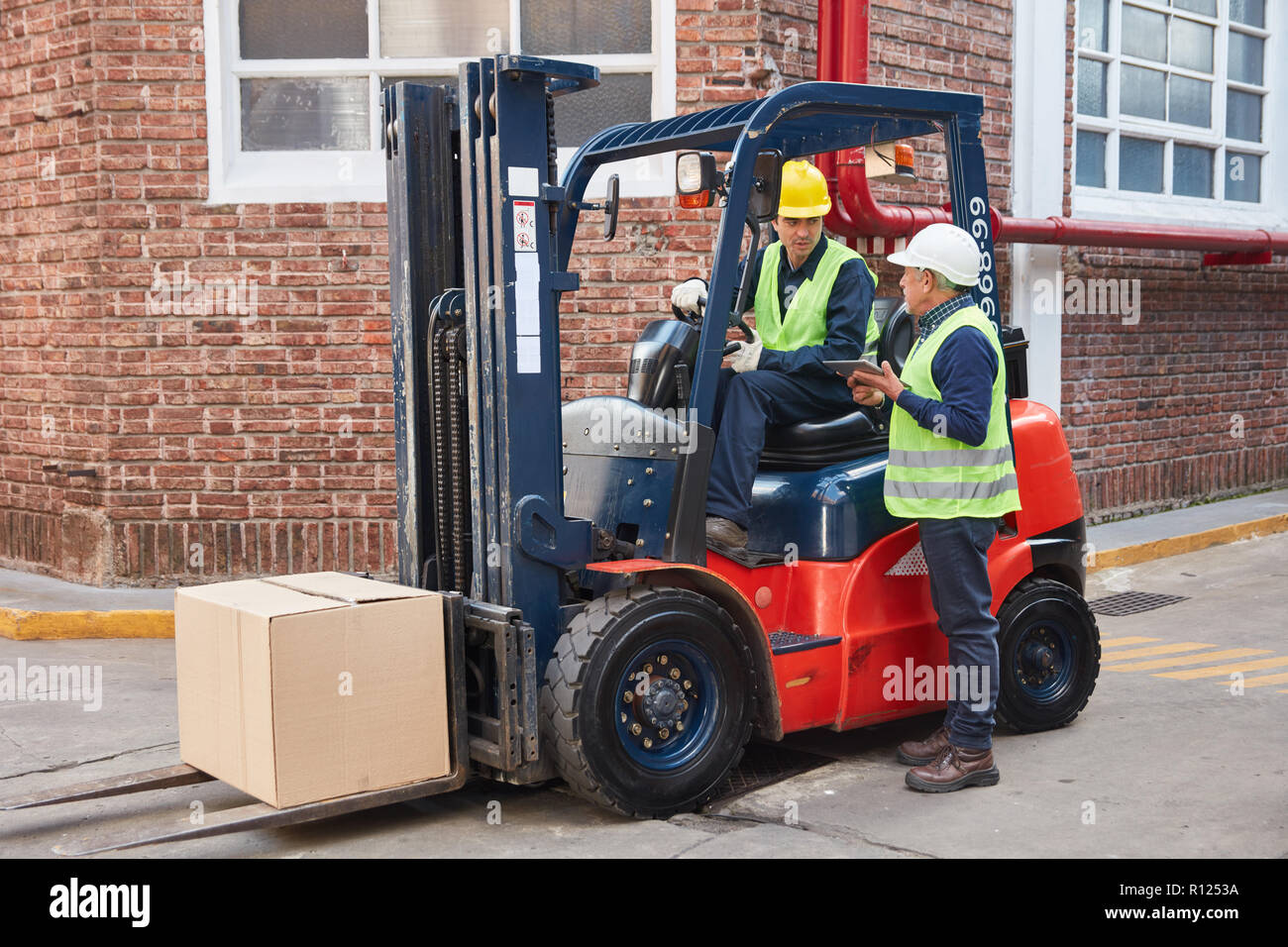 Forklift worker hi-res stock photography and images - Alamy
