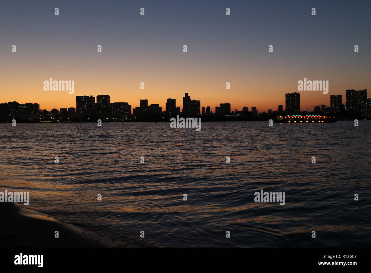 View from Odaiba Beach to Tokyo Bay at dusk, Tokyo, Japan Stock Photo ...