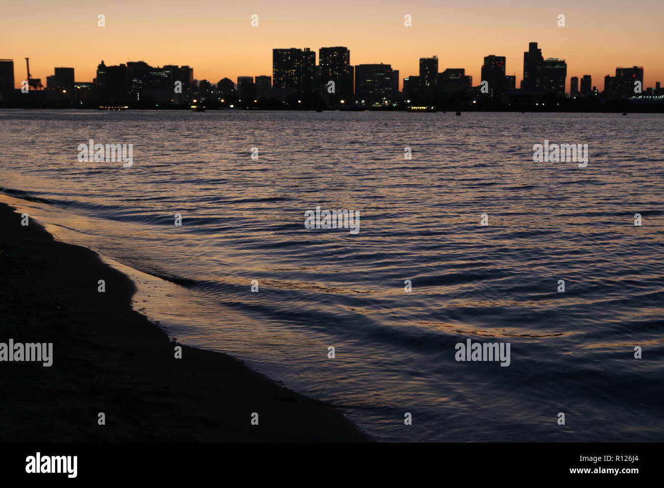 View from Odaiba Beach to Tokyo Bay at dusk, Tokyo, Japan Stock Photo ...