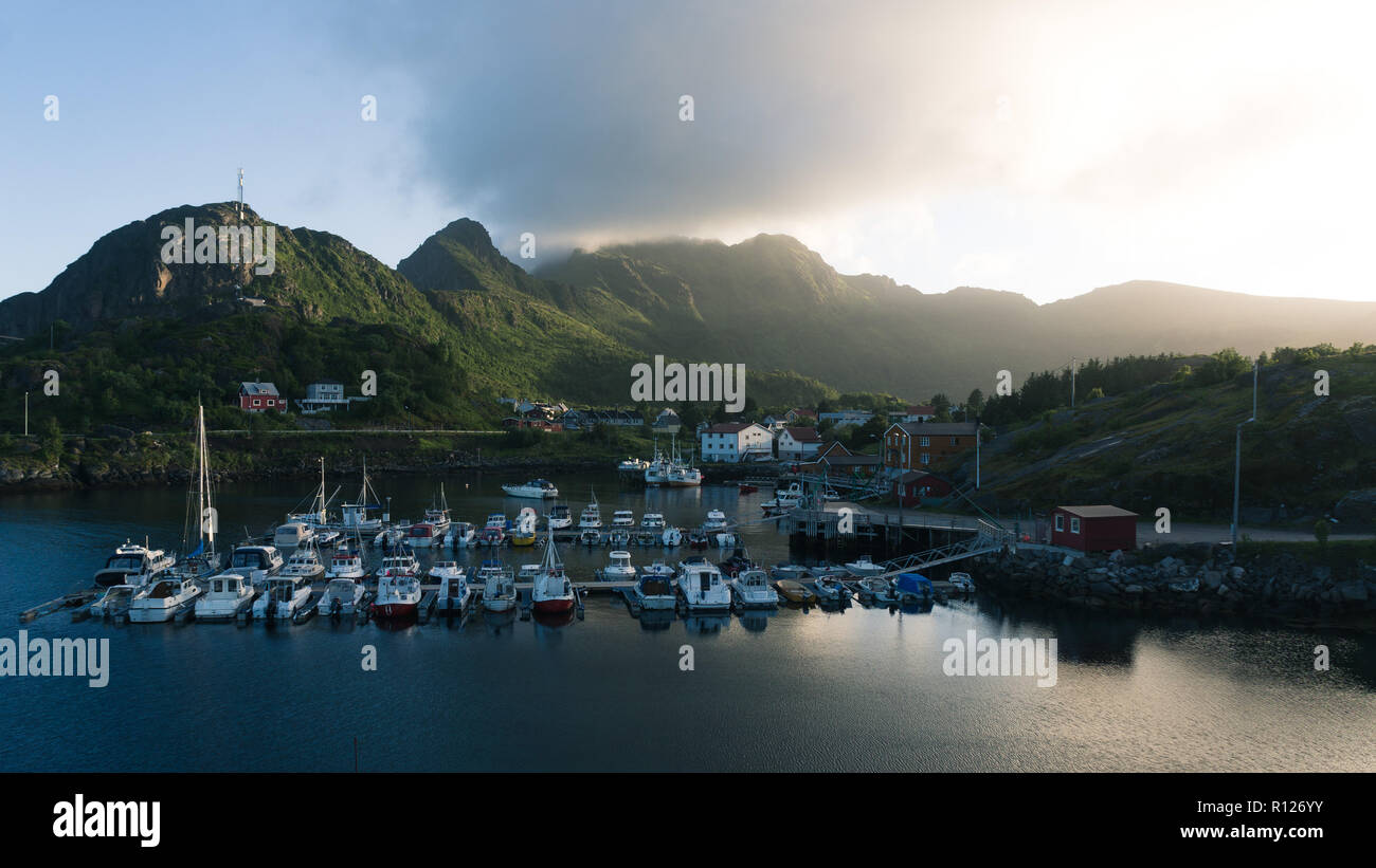 Beautiful landscape of picturesque harbor with fishing boat and ...