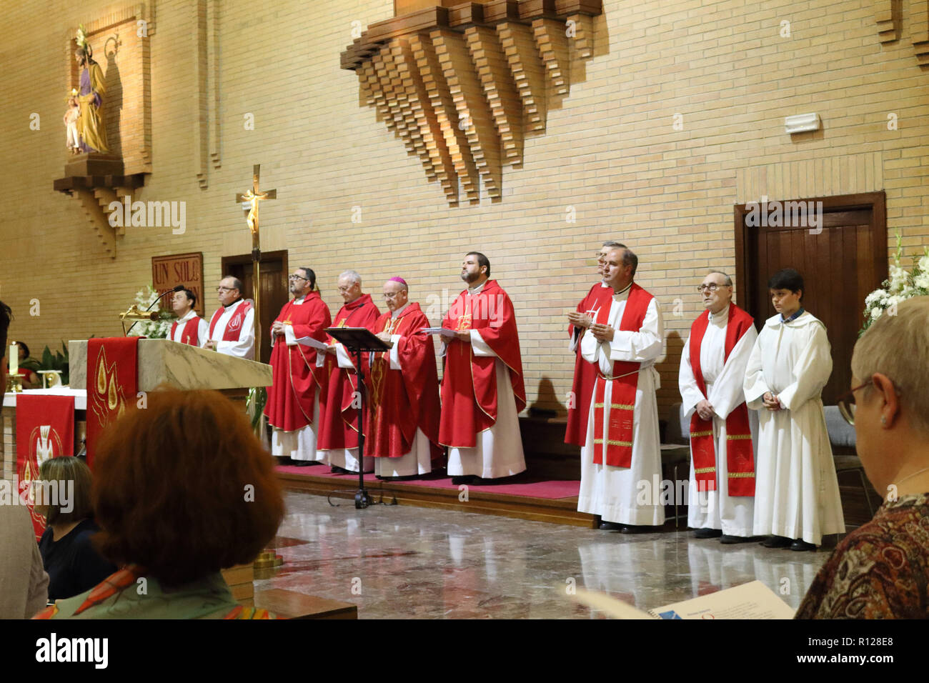 The celebration of a Roman Catholic mass with the archbishop and a ...