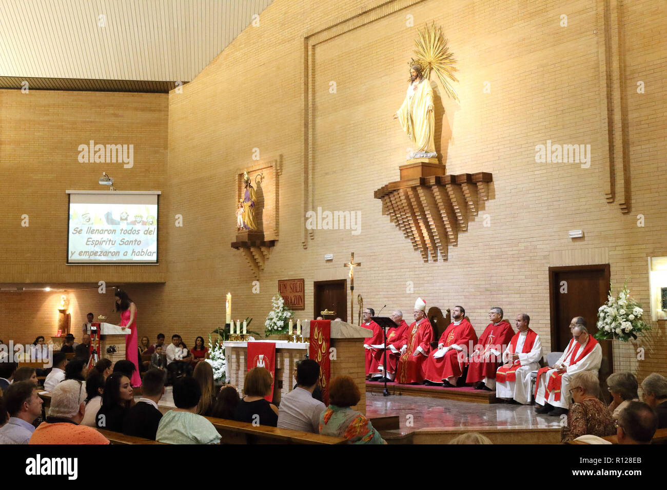 The celebration of a Roman Catholic mass with the archbishop and a ...