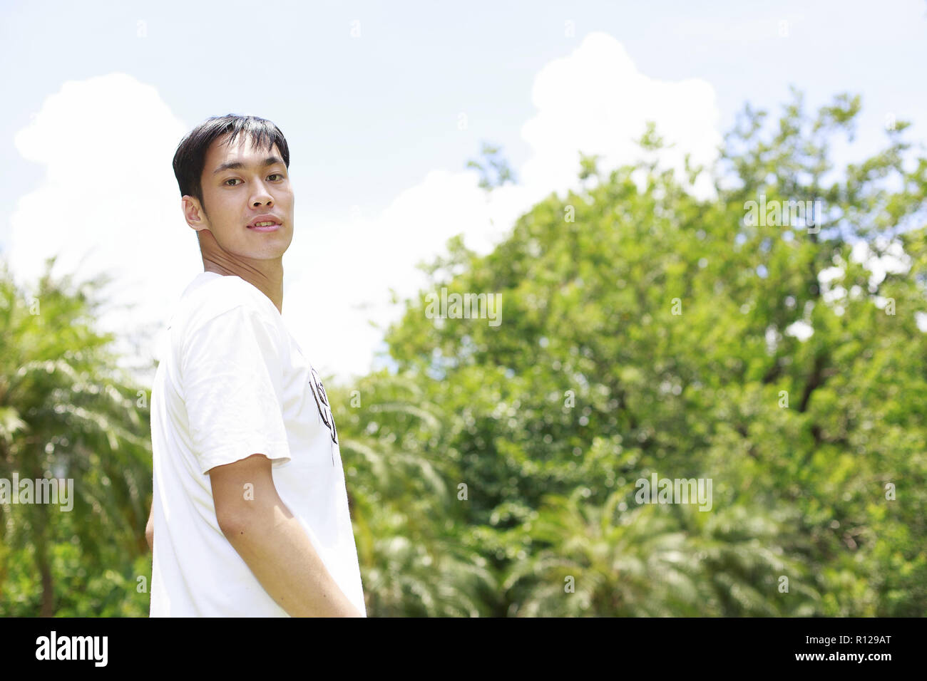 Man looking back Stock Photo - Alamy