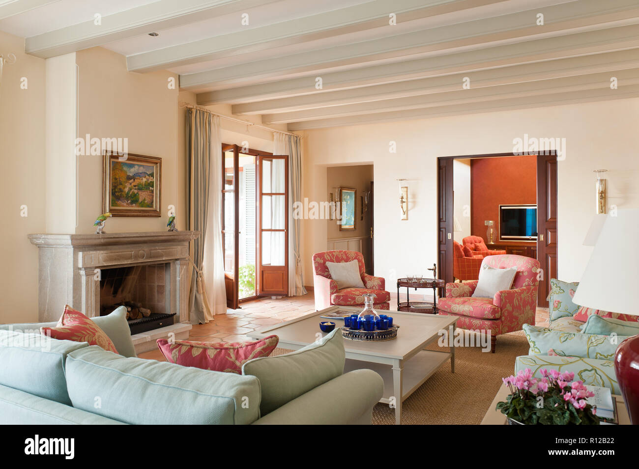 Country style living room with floral patterns Stock Photo - Alamy