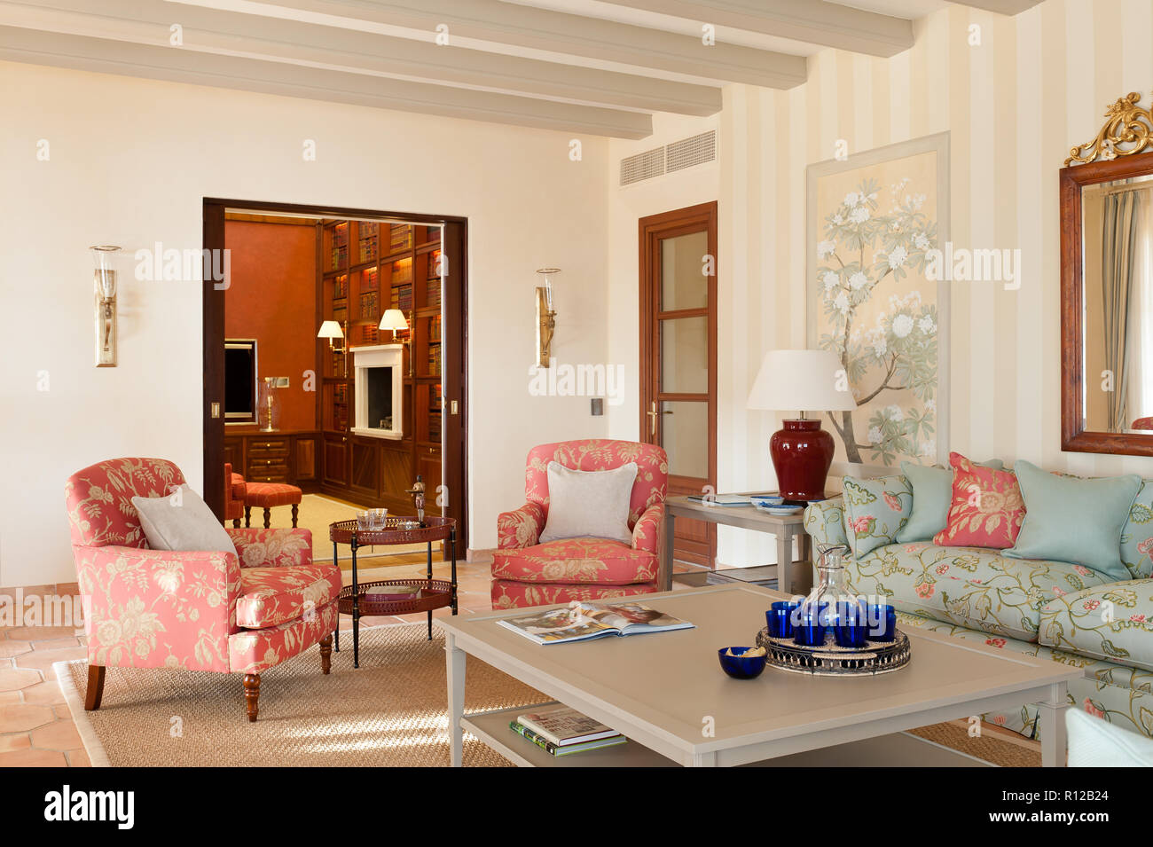 Country style living room with floral patterns Stock Photo - Alamy