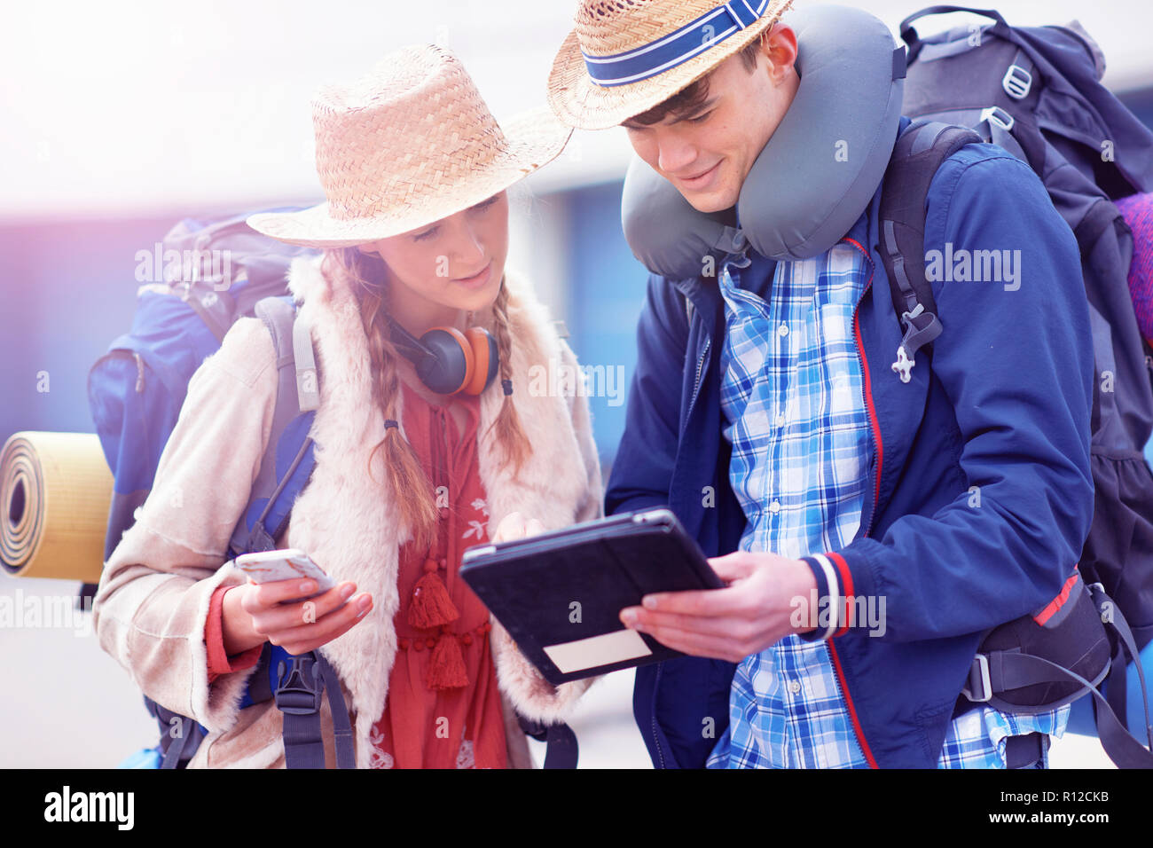 Backpacker couple using digital hi-res stock photography and images - Alamy