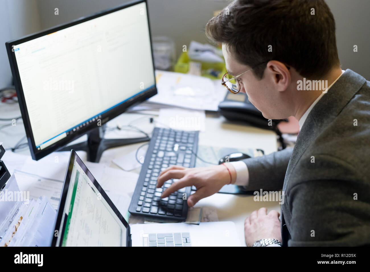 Businessman using desktop in hi-res stock photography and images - Alamy