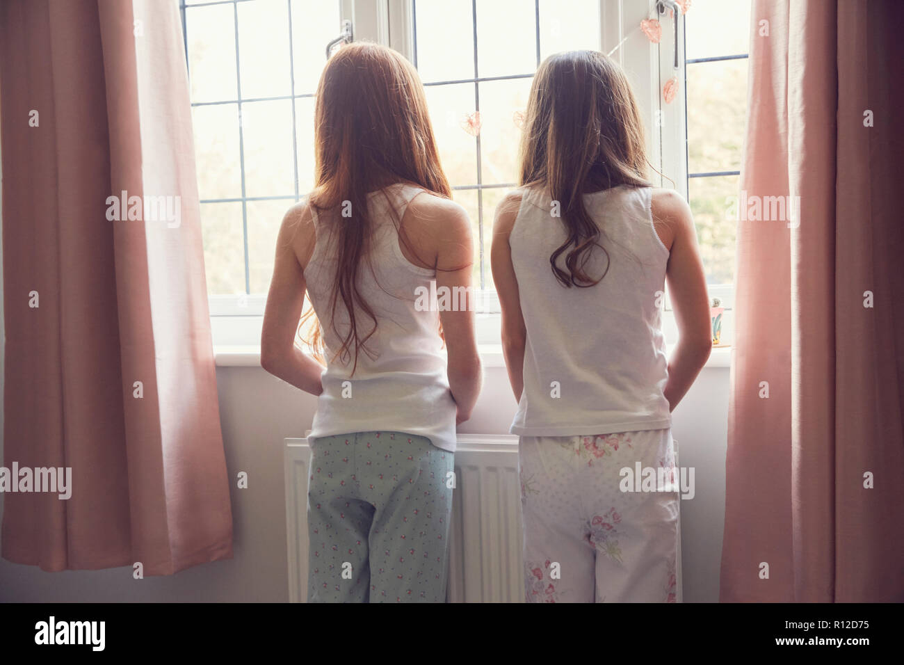 Best friends waking up together Stock Photo - Alamy