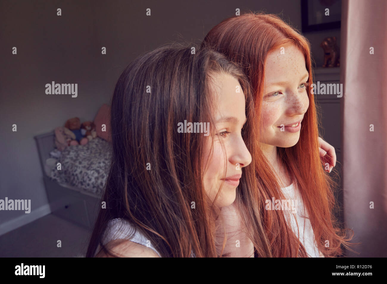 Best friends waking up together Stock Photo - Alamy