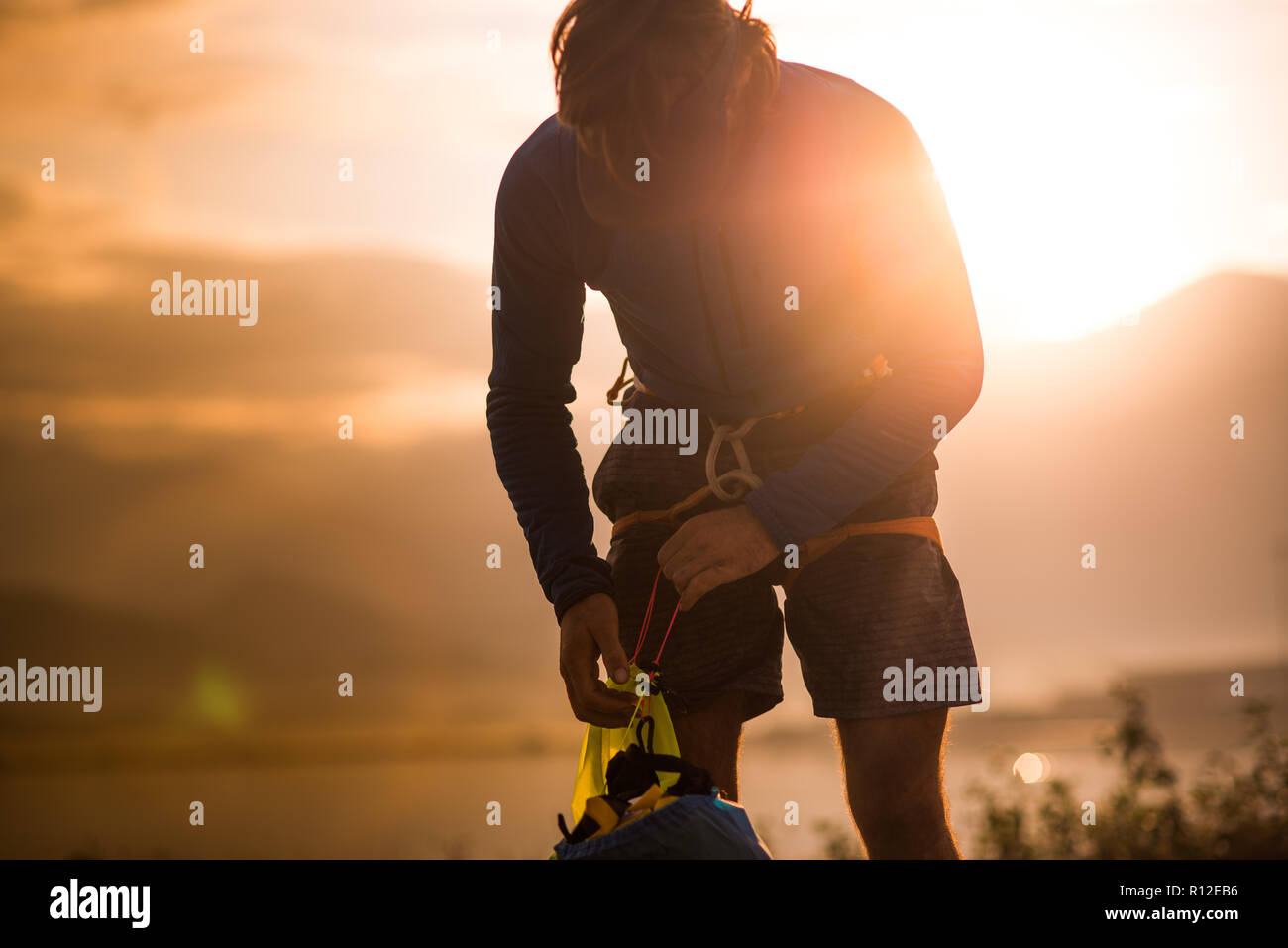 Climbing man silhouette hi-res stock photography and images - Alamy