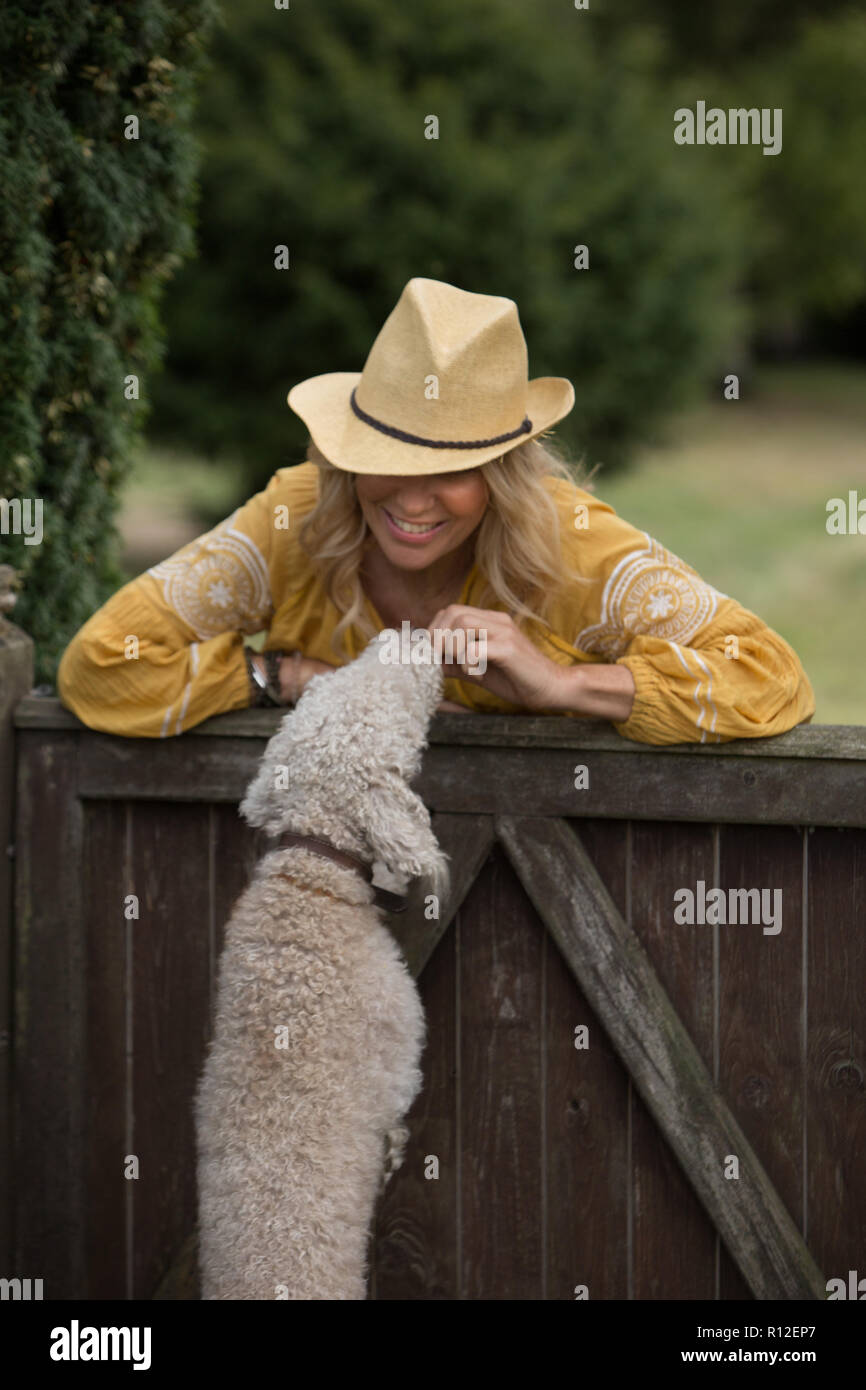 Playing woman in yellow hi-res stock photography and images - Alamy