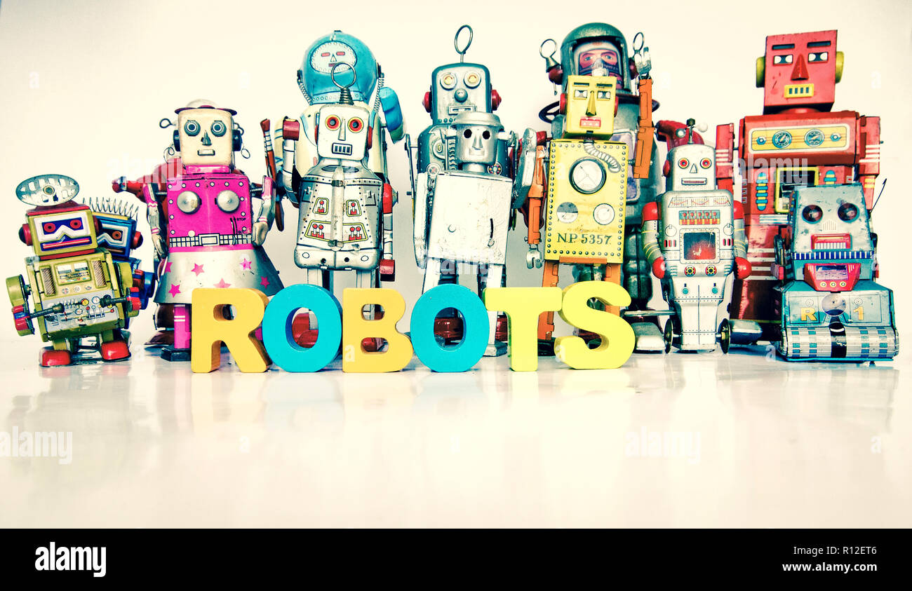 Big Family of robots with thw words ROBOTS with wooden letters Stock ...