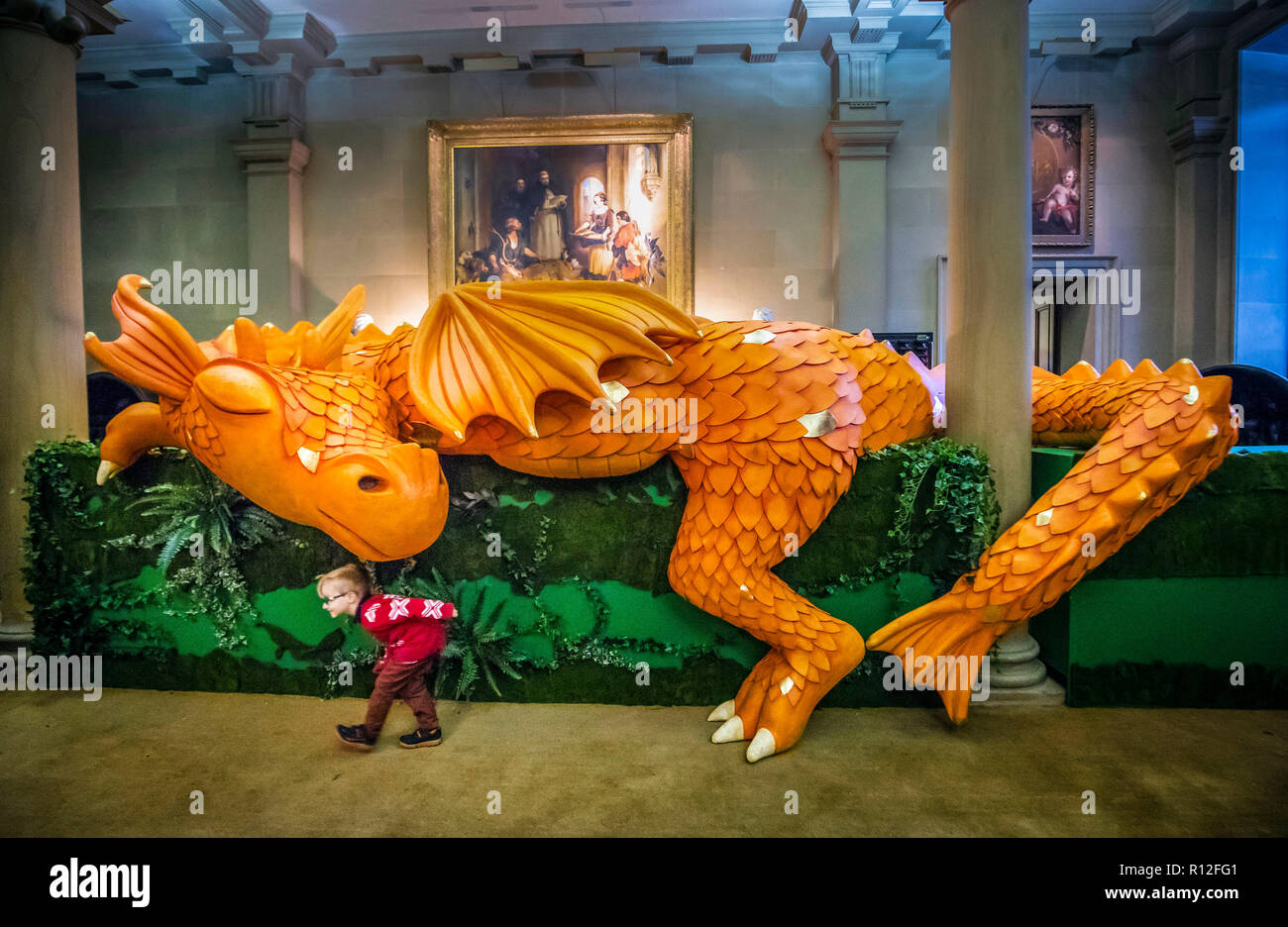 Toby Renshaw plays next to Arthur the dragon during the Chatsworth's ...