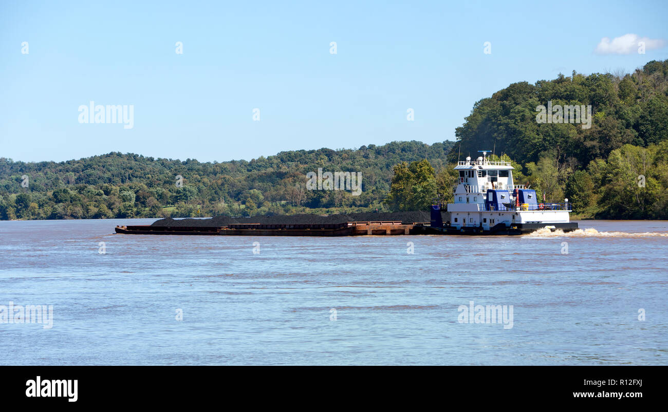 Tugboat pushing loaded coal barges upriver, Ohio River Stock Photo - Alamy