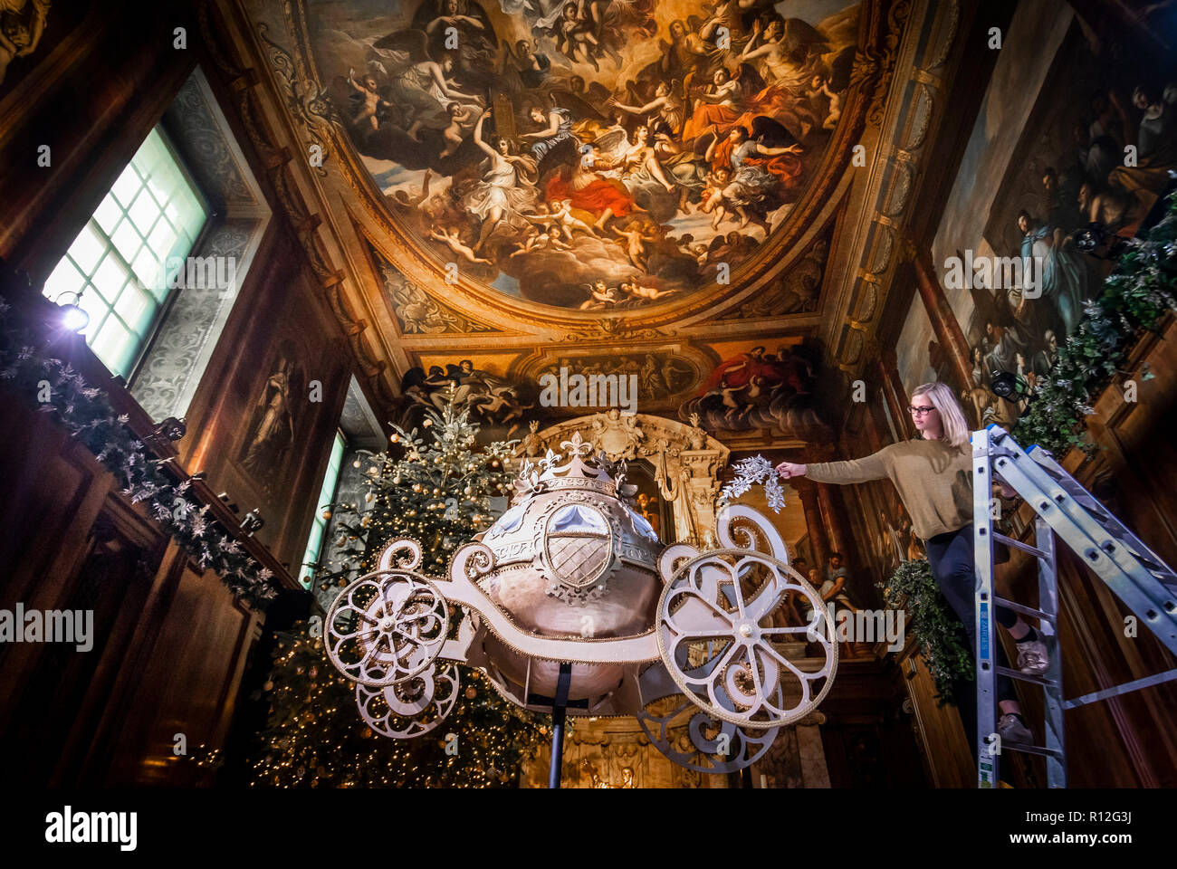 Rebecca Fallow puts the finishing touches to the Cinderella room during ...