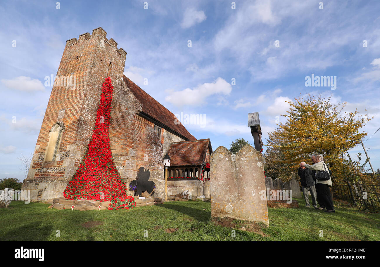 Over 4000 individually knitted poppies, part of a piece of art called ...