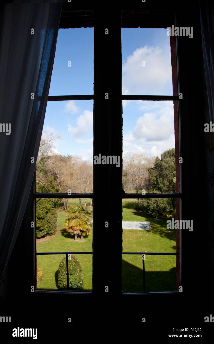 View of a park from a window Stock Photo - Alamy