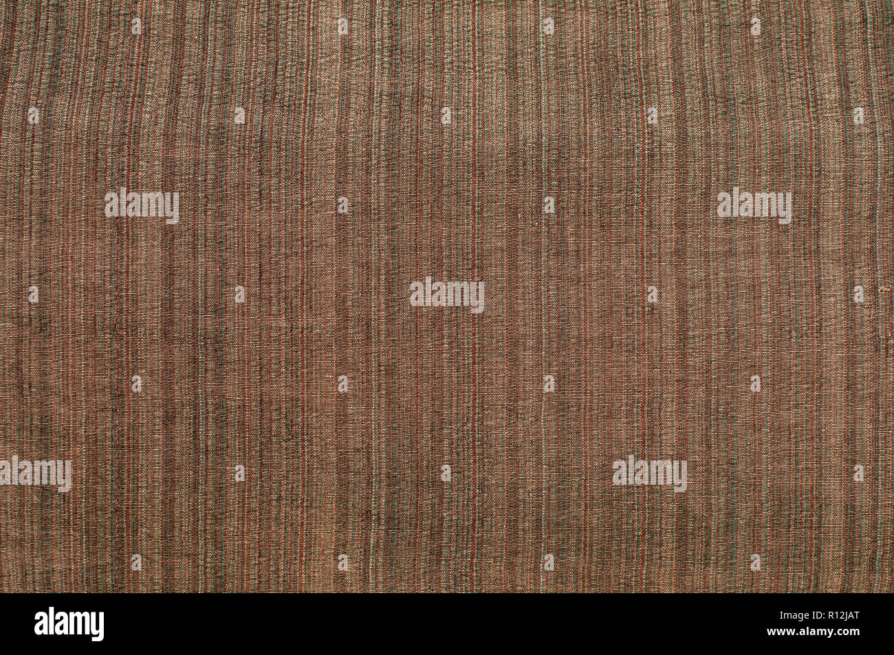 Silk and linen brown color natural fabric texture closeup as textile ...