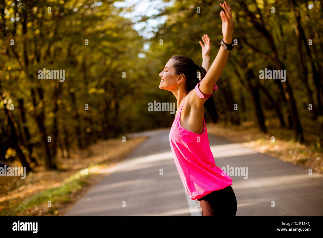 Female runner during outdoor workout in beautiful autumn mountain ...