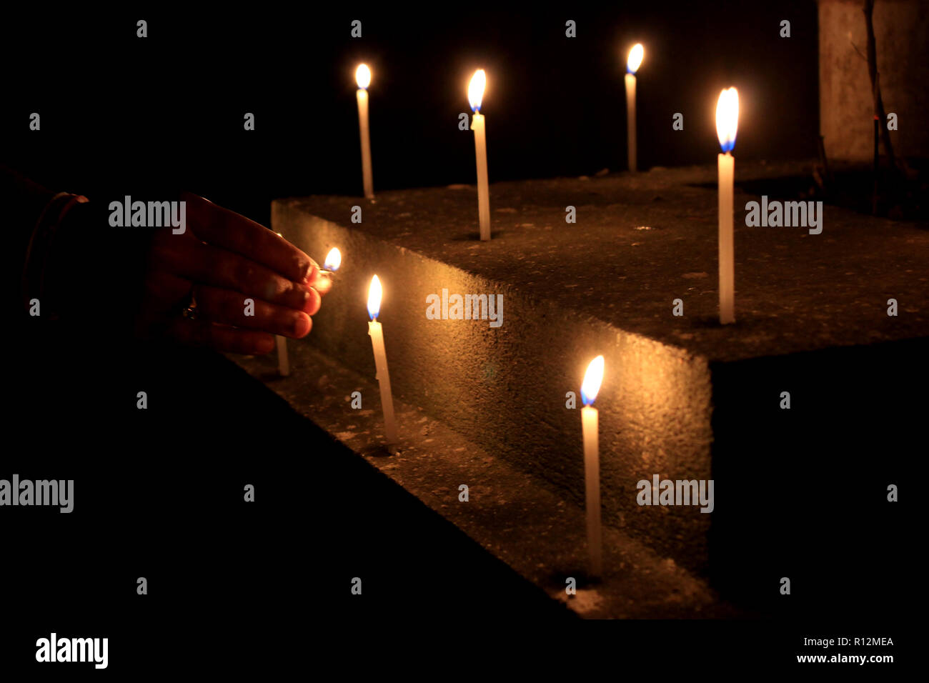 Candles on isolated black background. Flame candles lamps for the ...