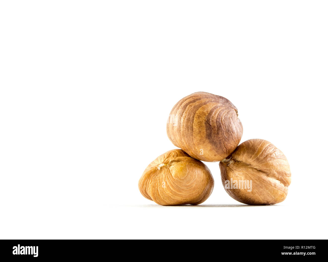 hazelnuts, hazelnut close-up isolated on a white background Stock Photo ...