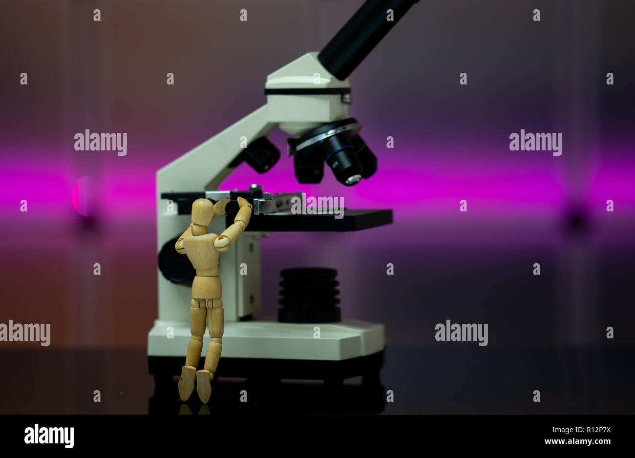 hinge drawing doll man and microscope Stock Photo - Alamy