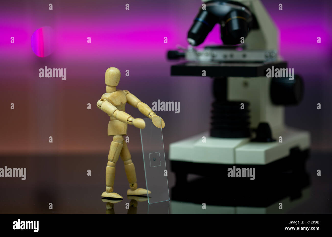 hinge drawing doll man and microscope Stock Photo - Alamy