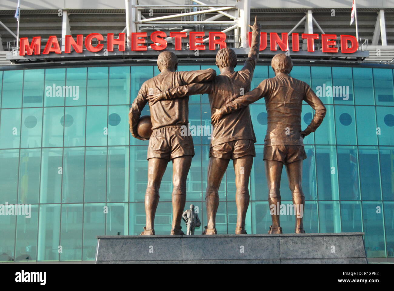 Man united trinity in front of stadium hi-res stock photography and ...