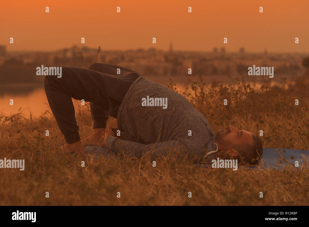 Supported bridge pose hi-res stock photography and images - Alamy