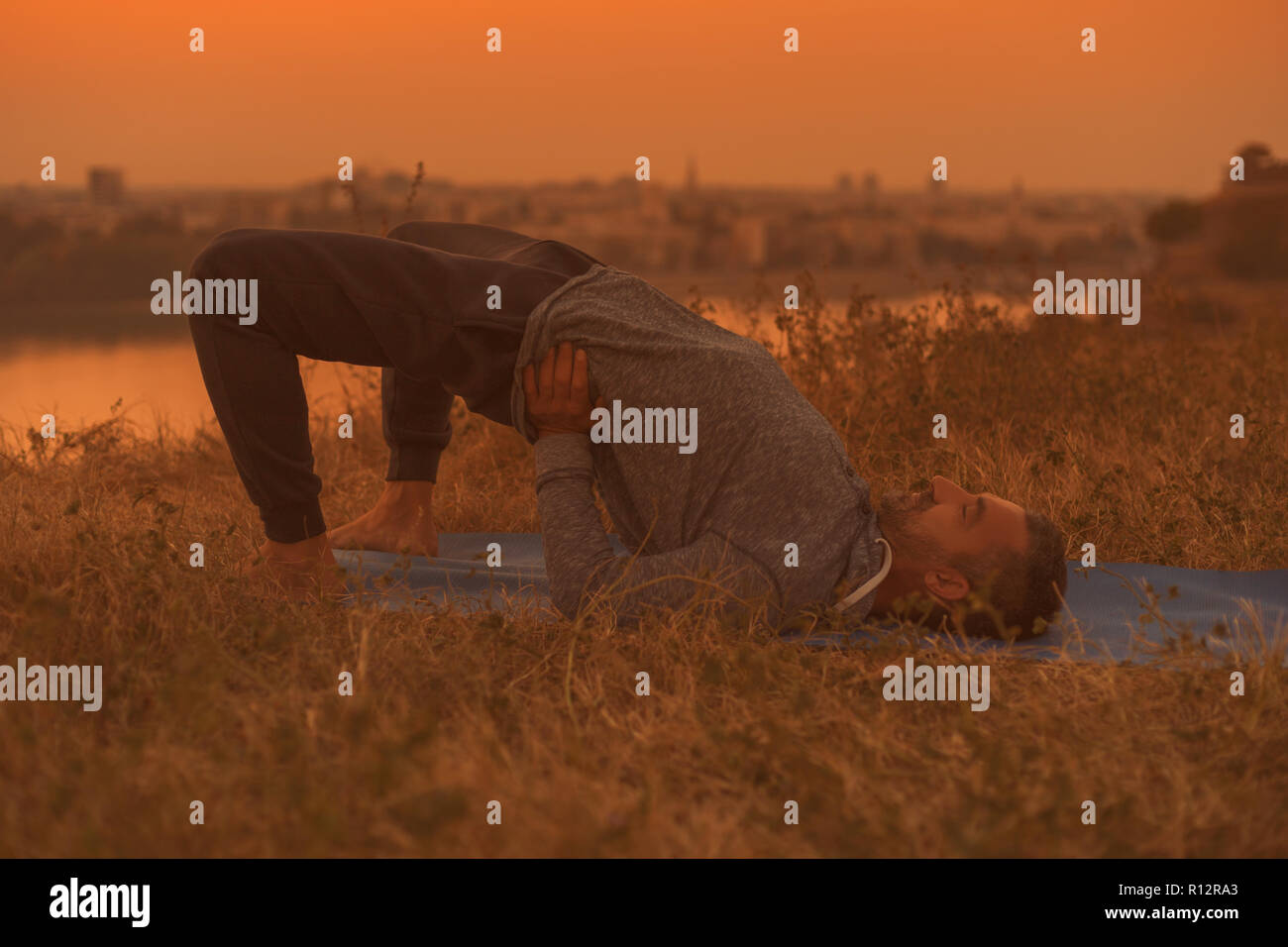 Supported bridge pose hi-res stock photography and images - Alamy