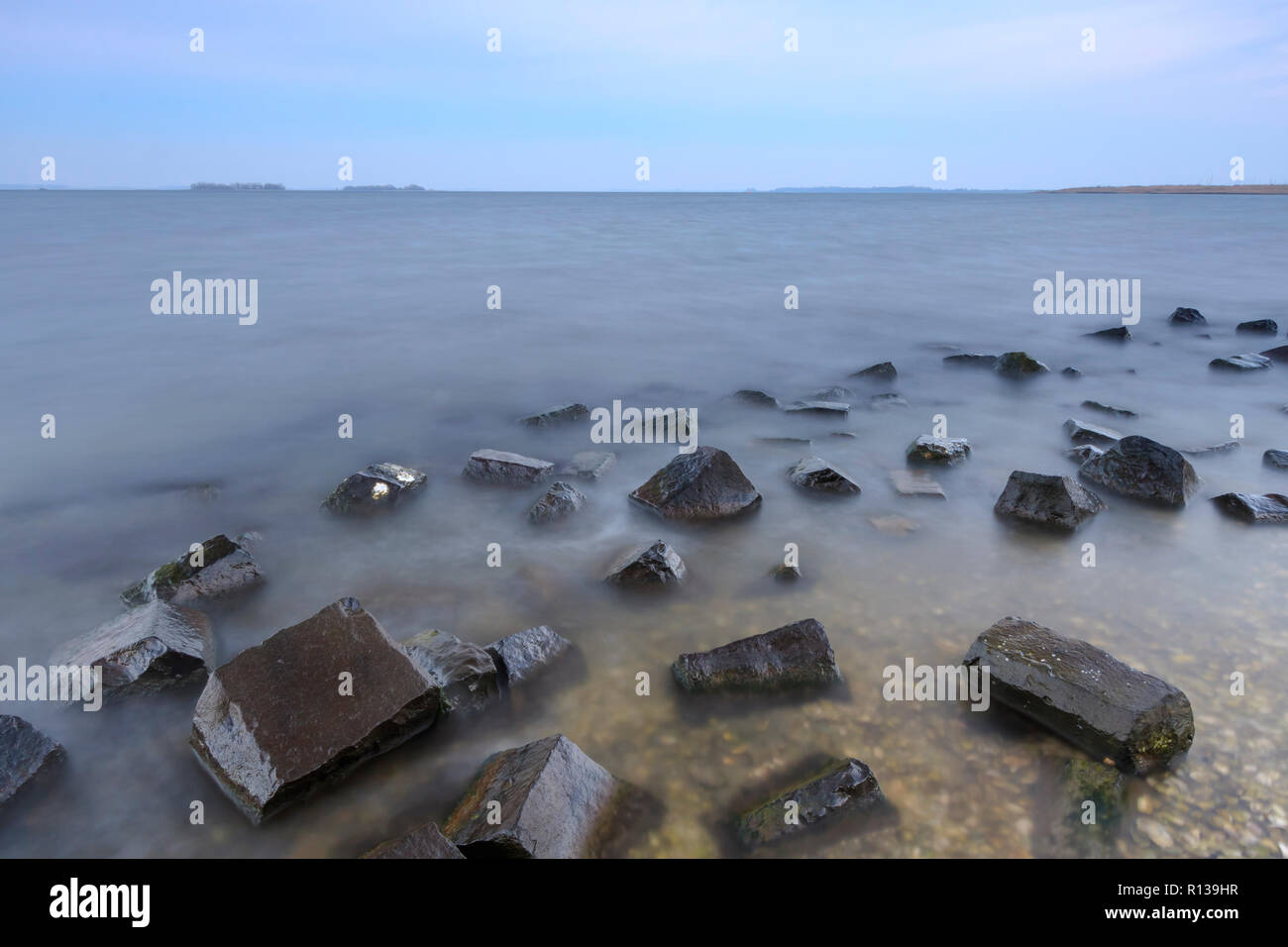 Rocks on the zeeland coast of the netherlands hi-res stock photography ...