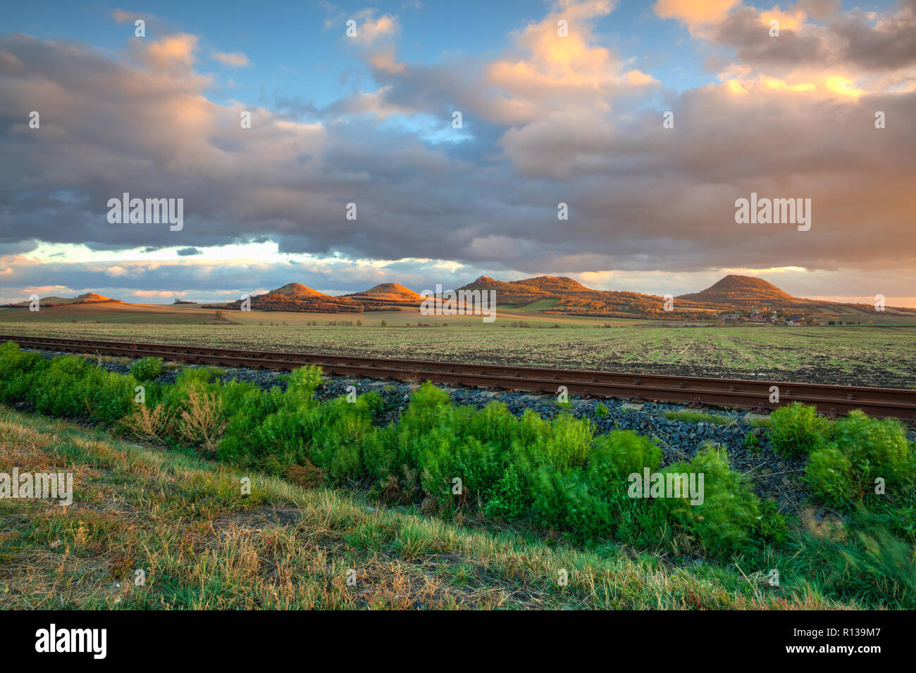 Single railway track at sunset, Central Bohemian Uplands, Czech ...