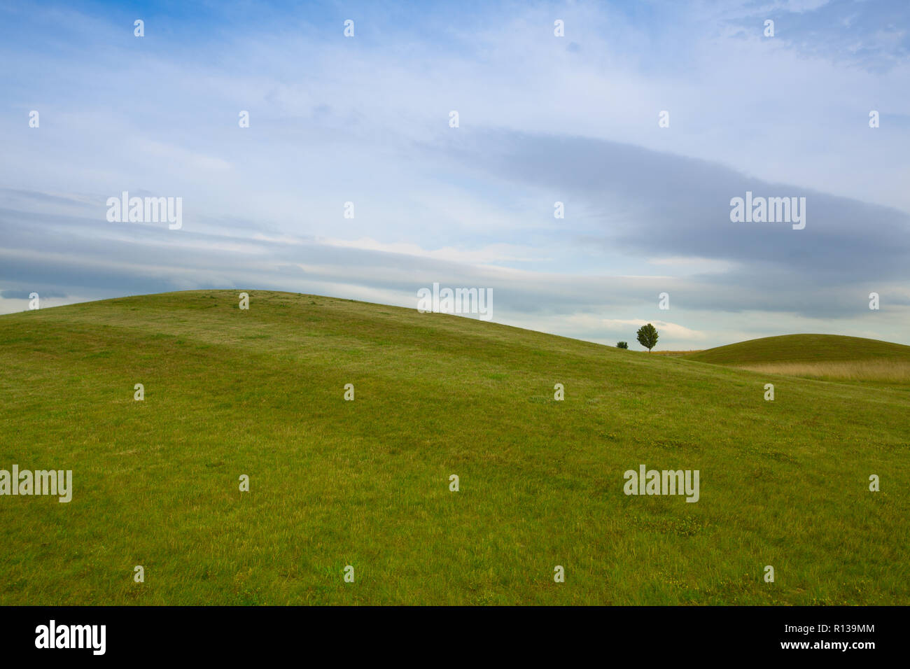 Detail of golf course and blue sky background Stock Photo - Alamy