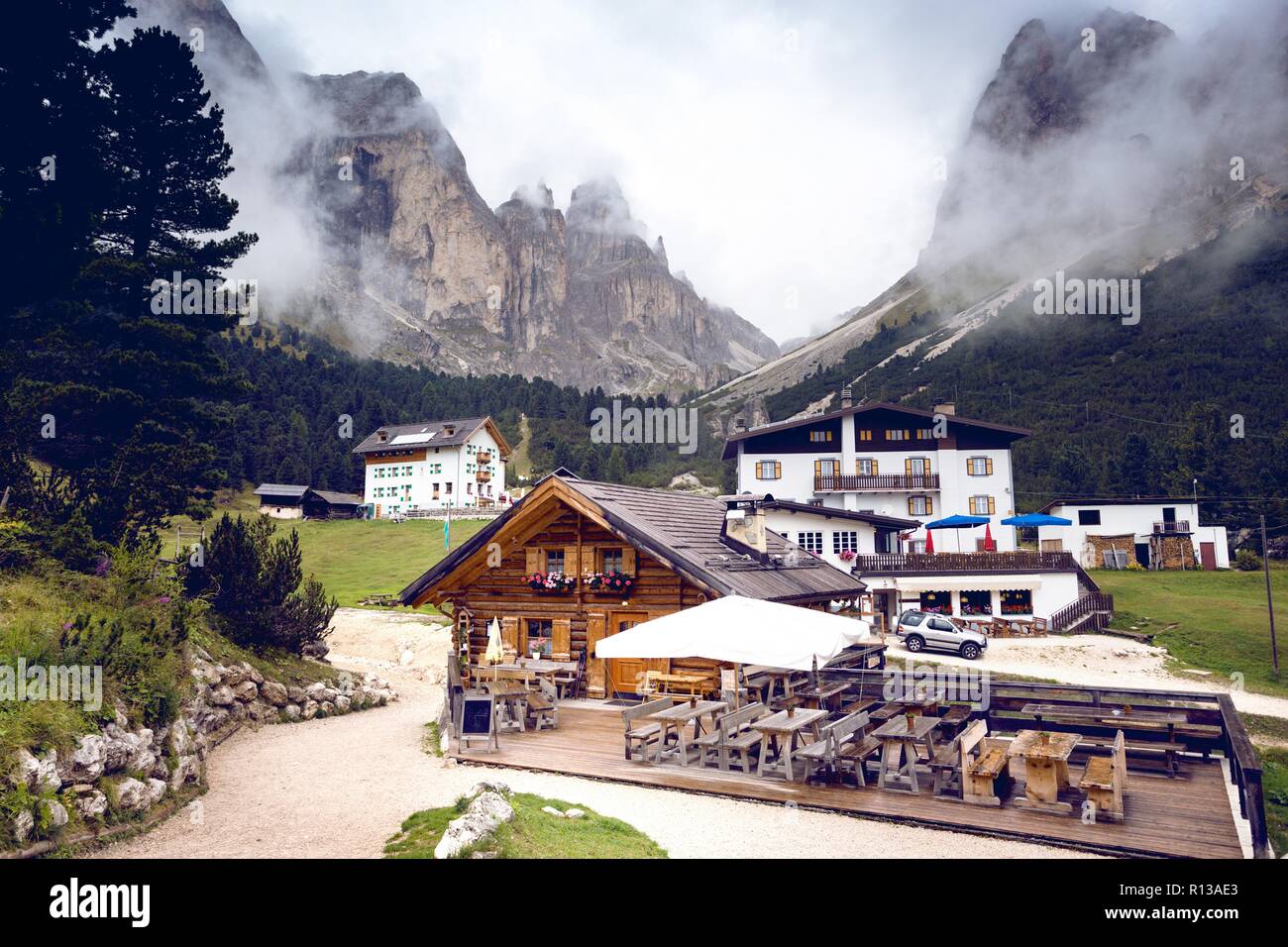 Rifugio and view of the valley in Pozza Di Fassa, Italy Stock Photo - Alamy