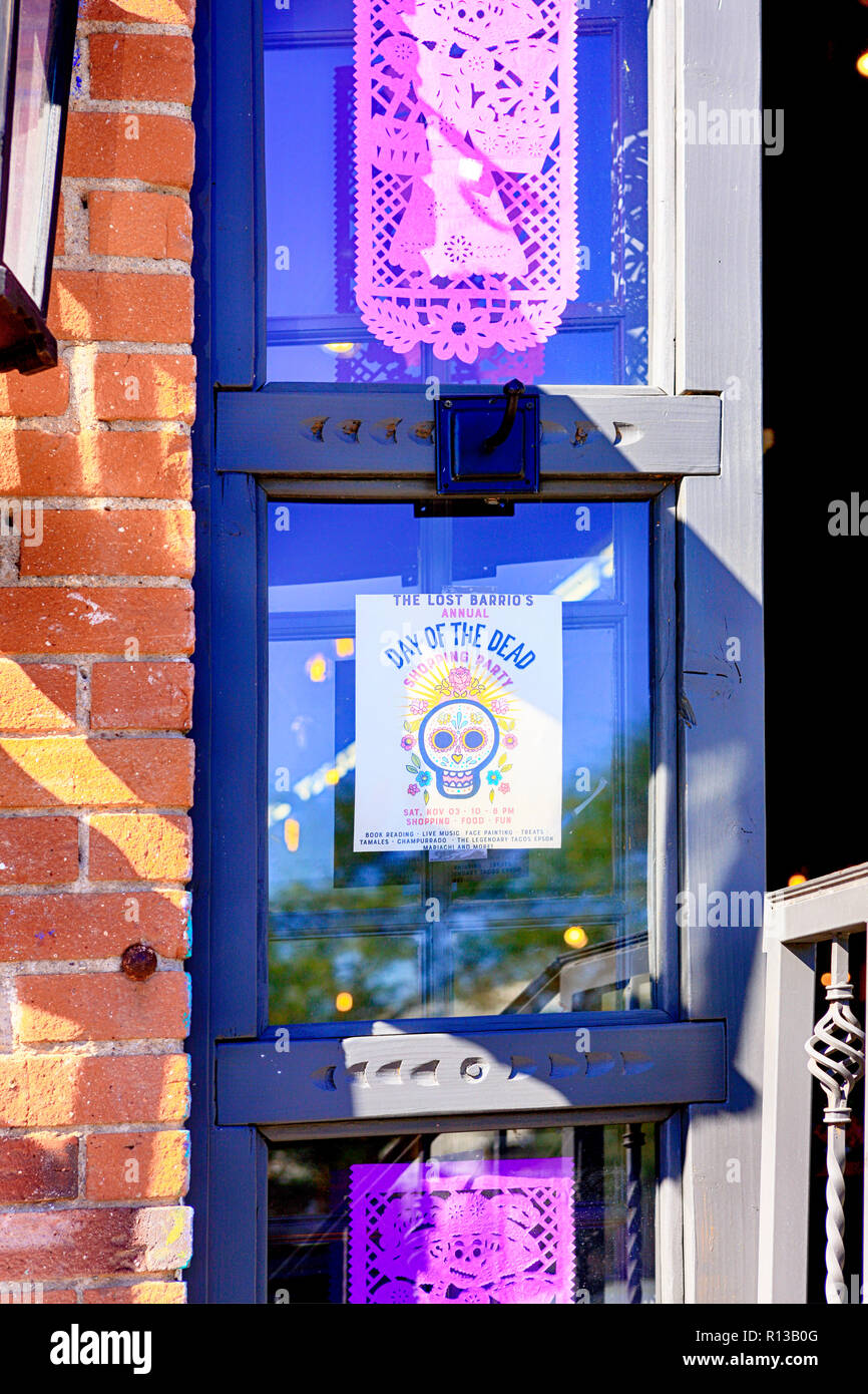 Day of the dead notices on a window inside a store in the Lost Barrio ...