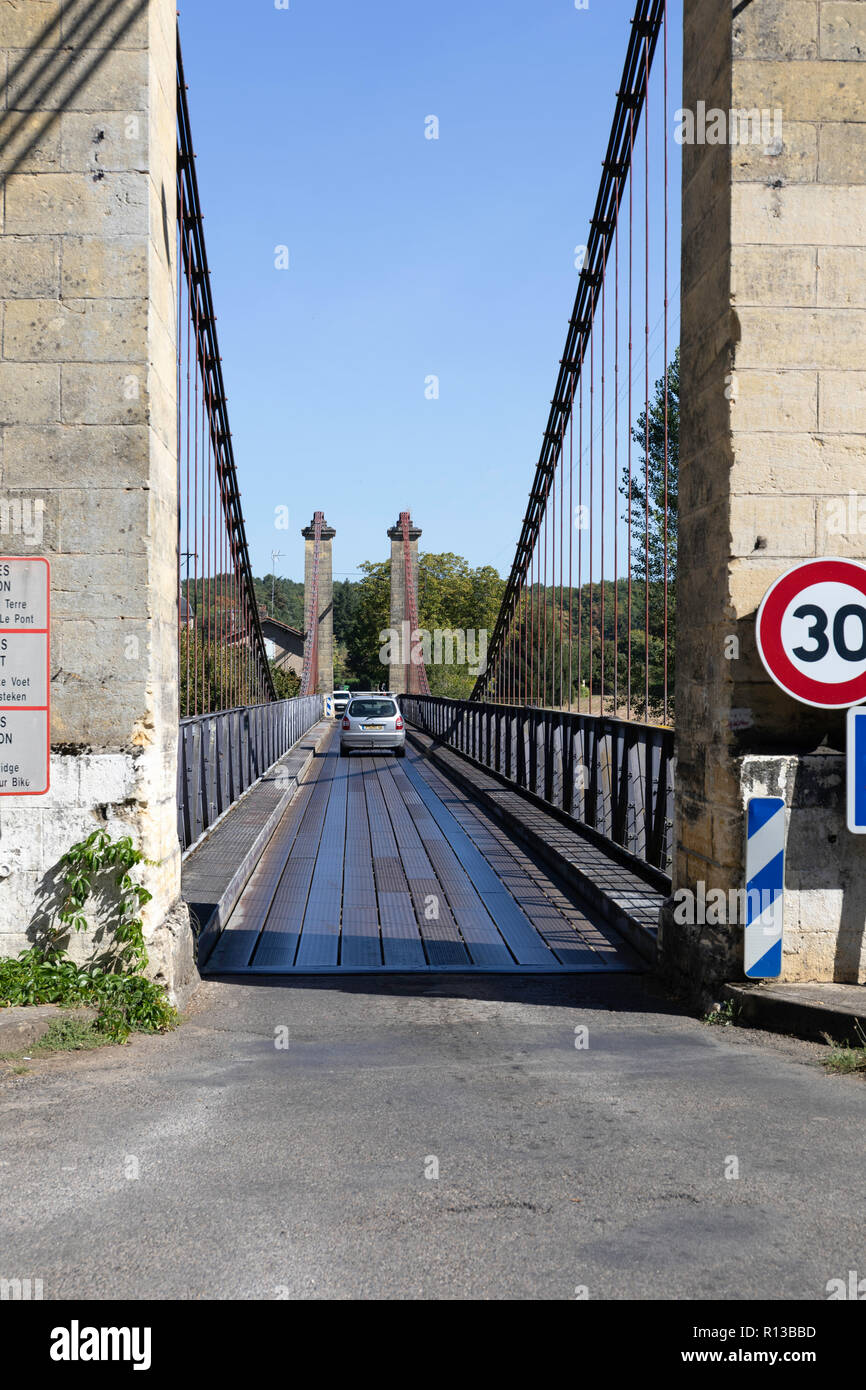 Old suspension bridge crossing the river Lot, France Stock Photo - Alamy