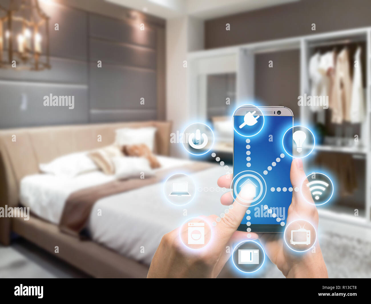 Smart home automation app on mobile with home interior in background ... Smart home automation app on mobile with home interior in background ...